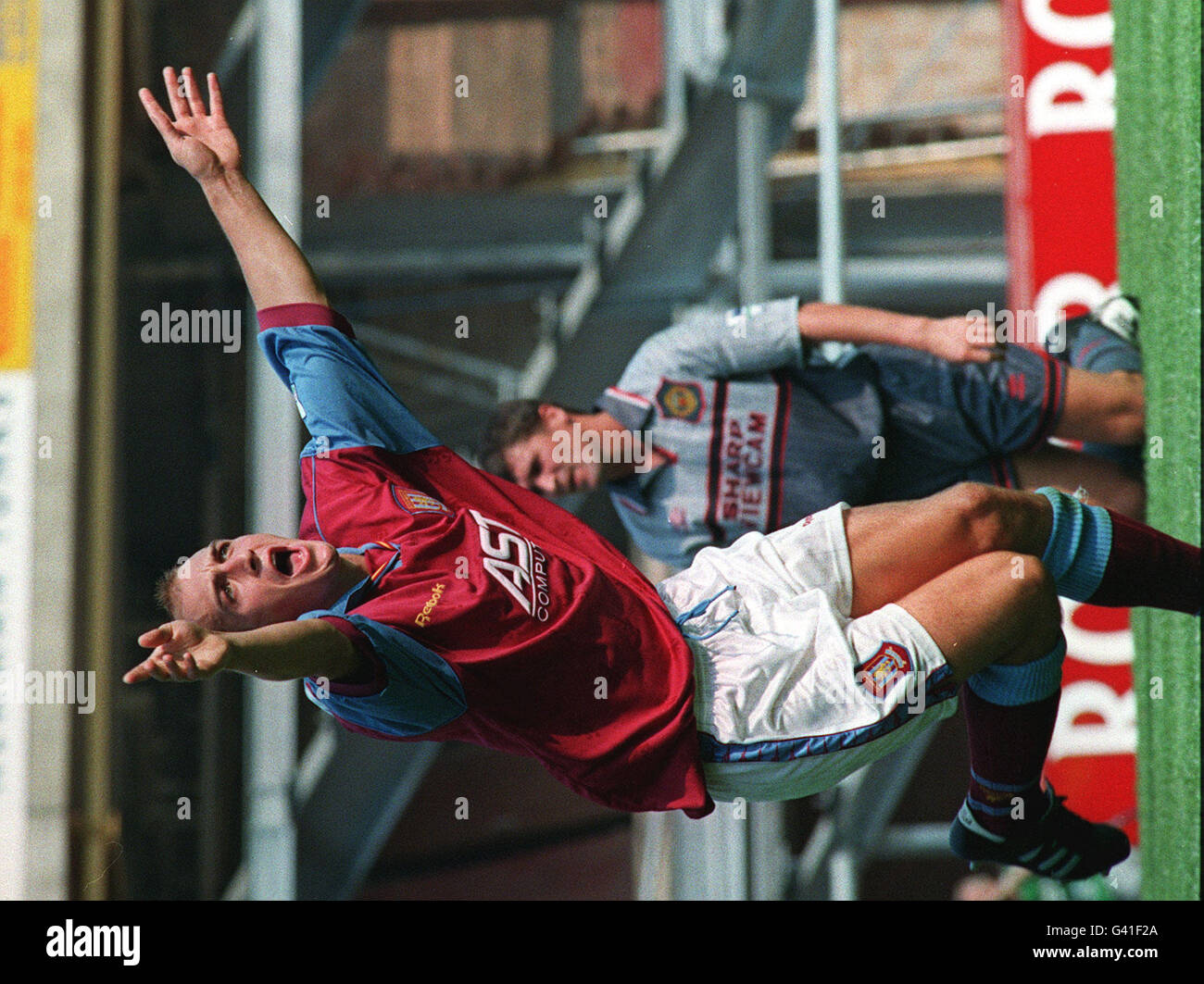 Aston Villa's Mark Draper celebrates his goal as he makes his ...