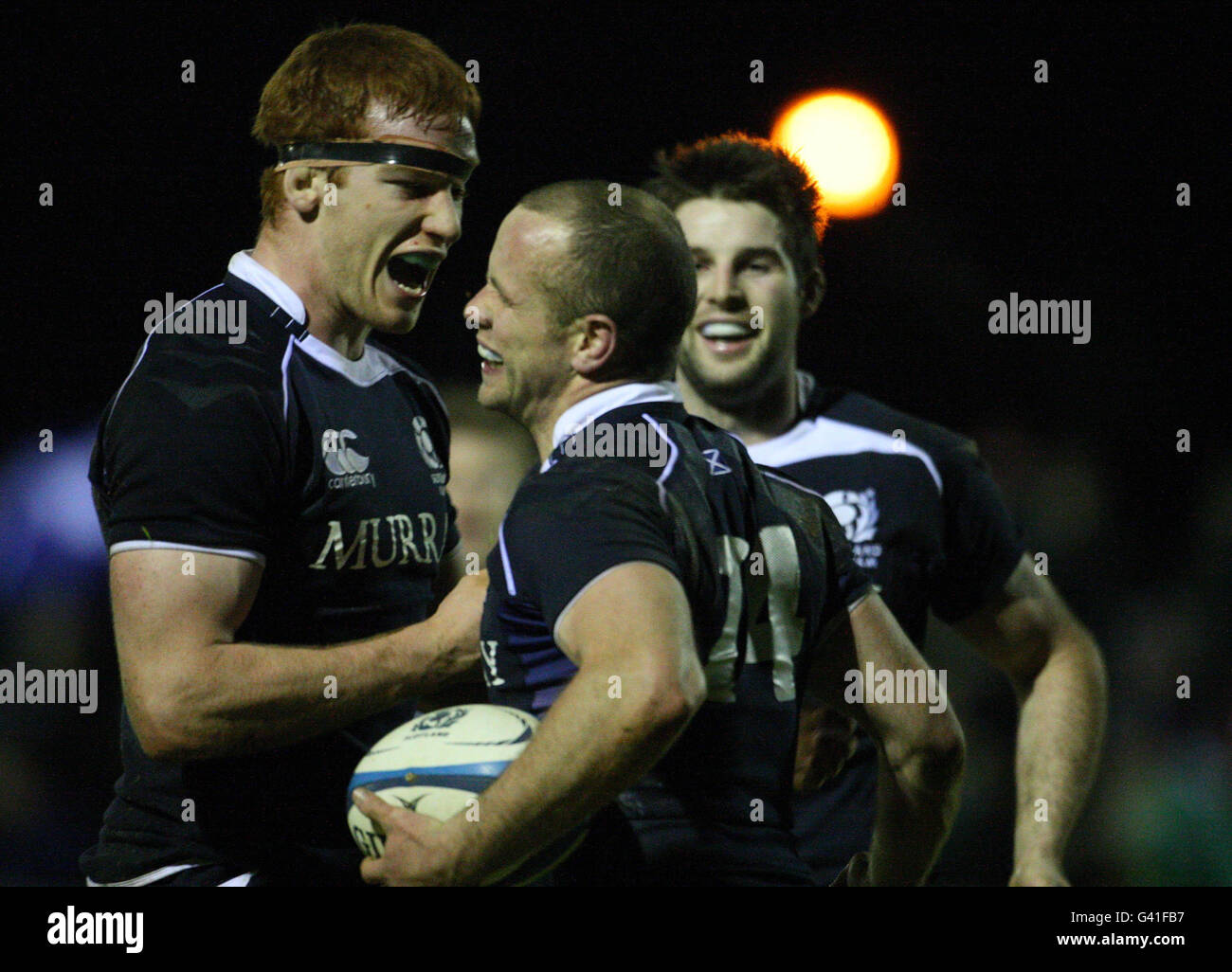 Scotland's Hefin O'Hare (14) celebrates with Rob Harley after scoring ...