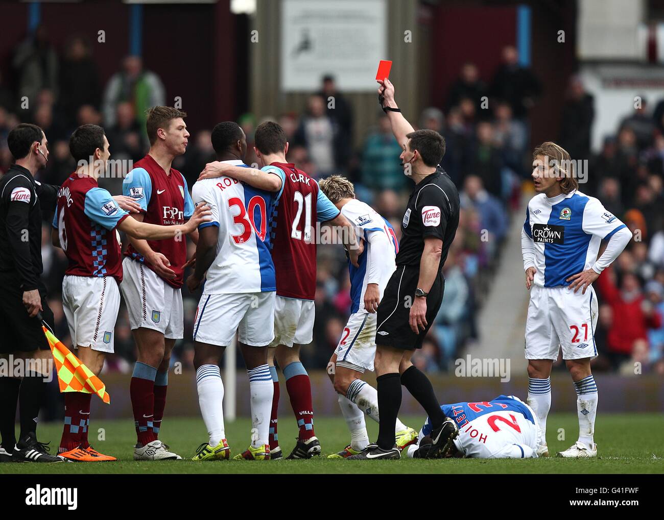 Aston Villa's Nathan Baker (third left) is shown the red card by ...
