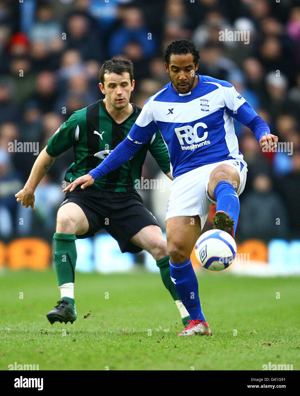 Birmingham City's Jean Beausejour (right) and Coventry City's Stephen O ...