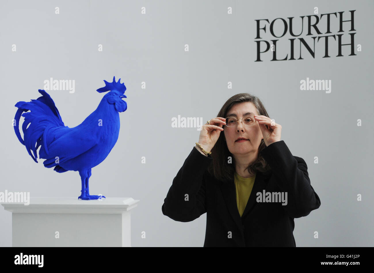 Artist Katharina Fritsch with her sculpture of a blue cockerel, one of ...