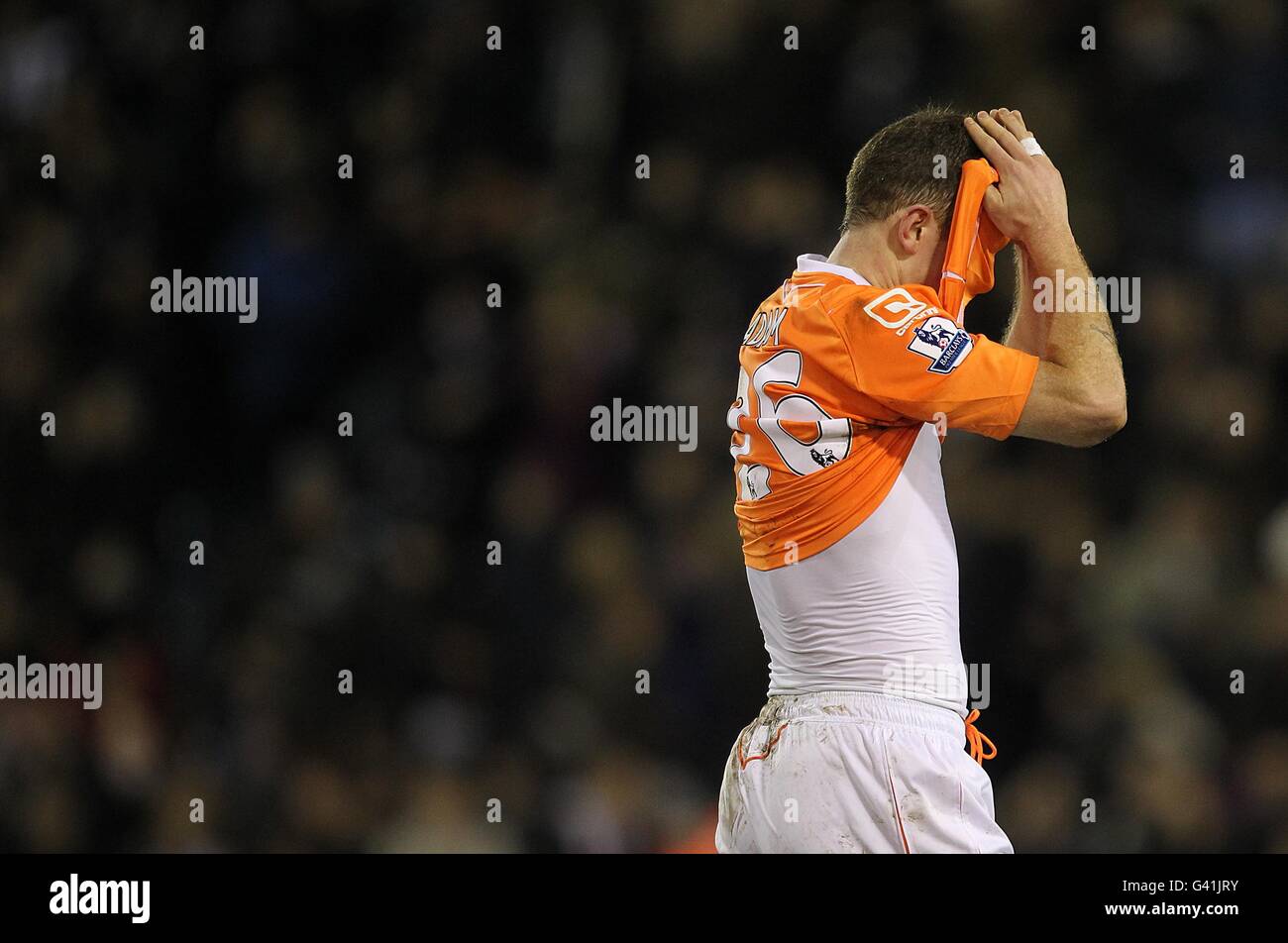 Blackpool's Charlie Adam shows his dejection after the final whistle ...