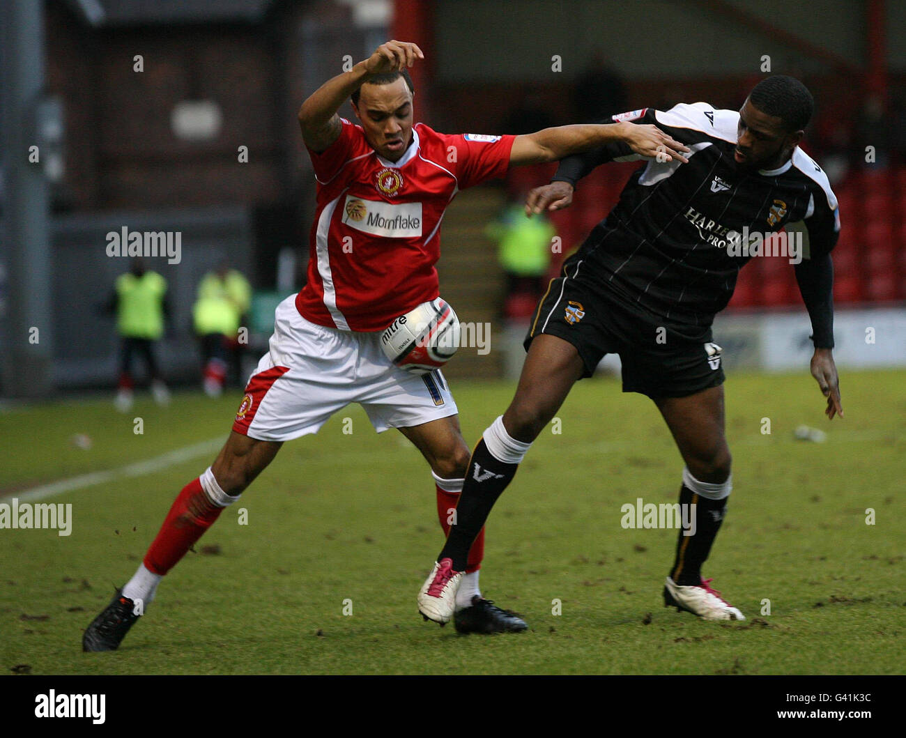 Crewe Alexandra's Byron Moore and Port Vale's Justin Richards battle ...