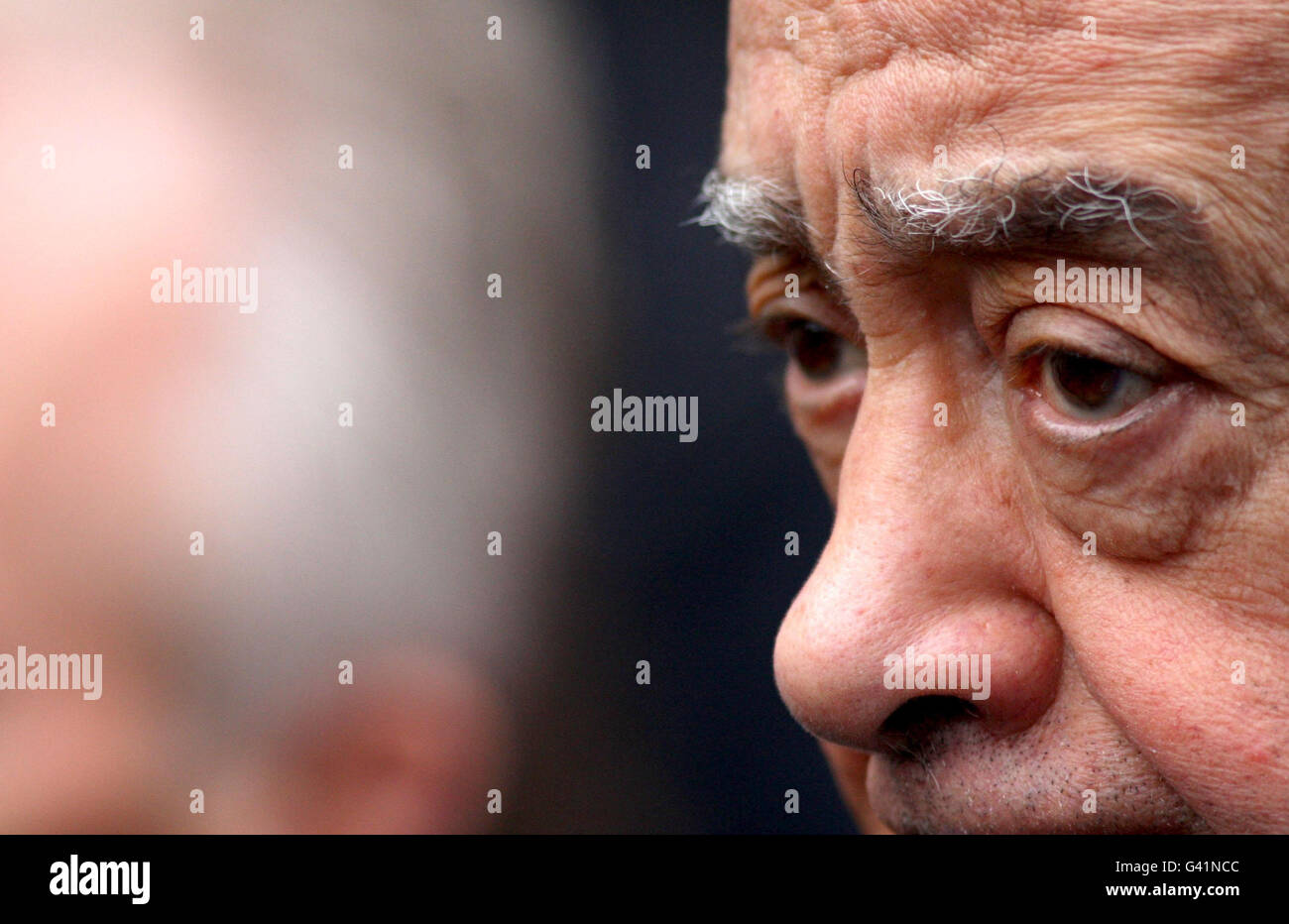 Mohamed al Fayed joins other local residents outside Surrey County Hall ...