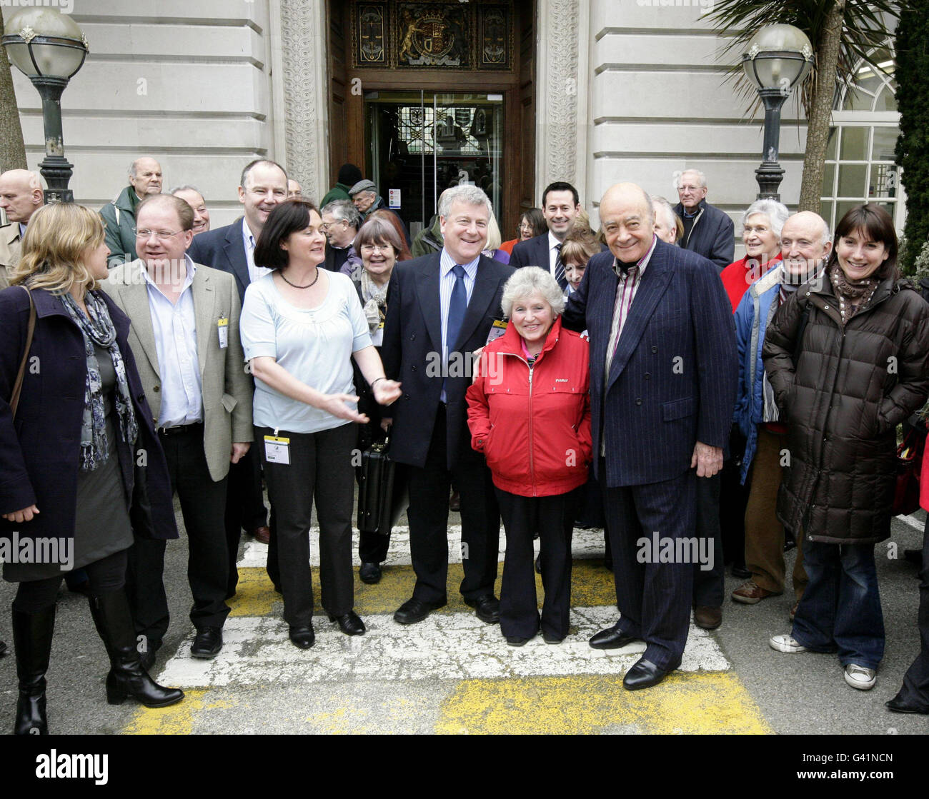 Mohamed al Fayed joins other local residents outside Surrey County Hall ...