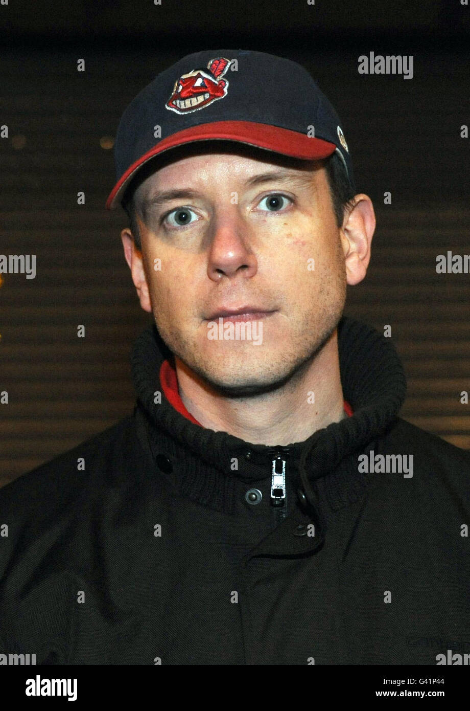 Local resident Tom Bridger, 36, poses for media after he witnessed an ...