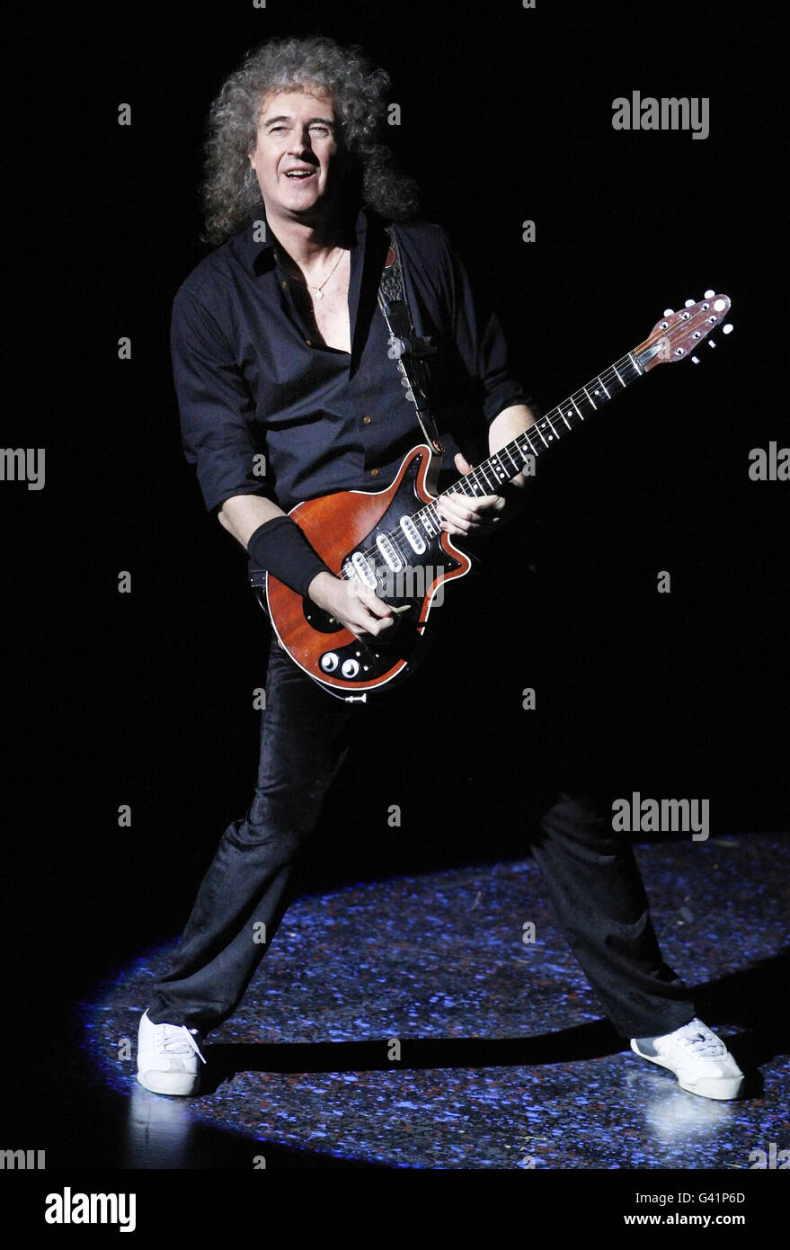 Brian May performs during a production of the musical We Will Rock You ...