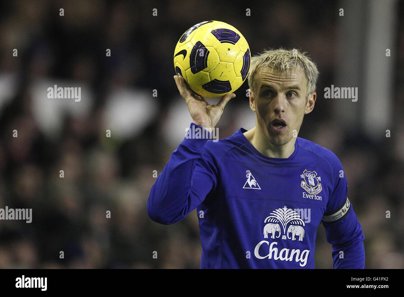 Half length mid top holding holds ball datacoapplies hi-res stock ...