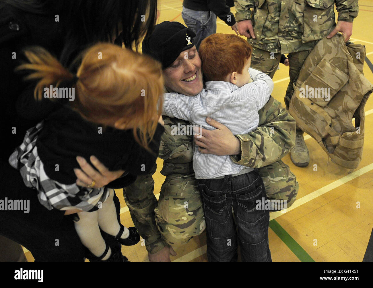 Servicemen of 2 Signal Regiment return to their base at Imphal Barracks ...