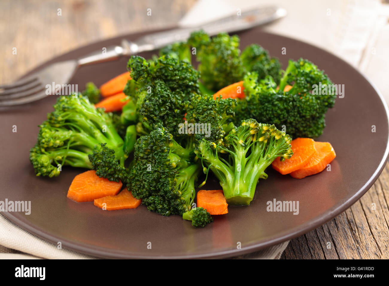 Steamed broccoli on plate Stock Photo - Alamy