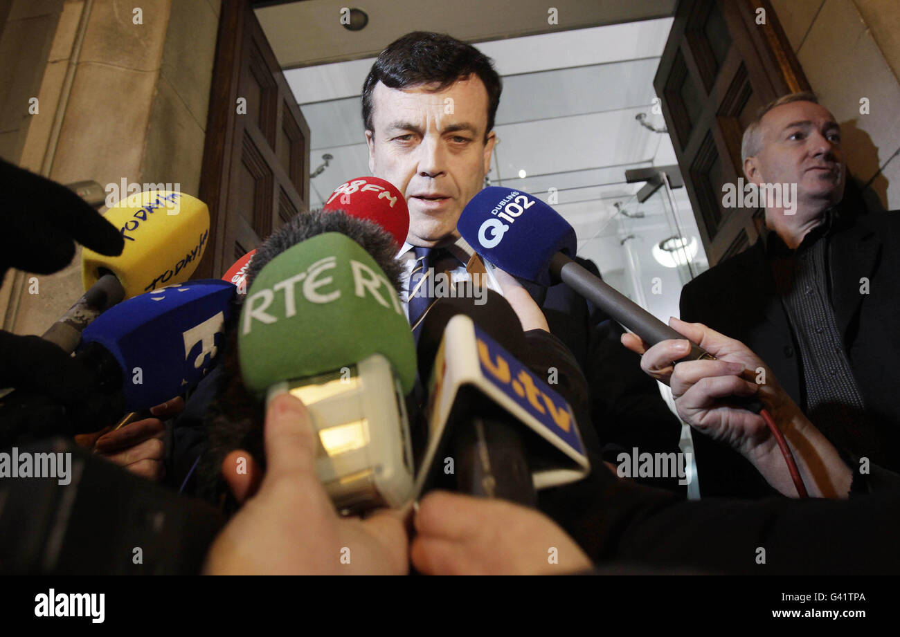 Finance Minister Brian Lenihan speaking to the media outside the ...