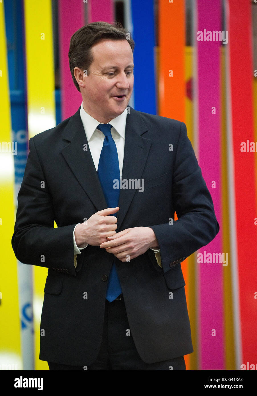 Britain's Prime Minister David Cameron is shown around one of the ...
