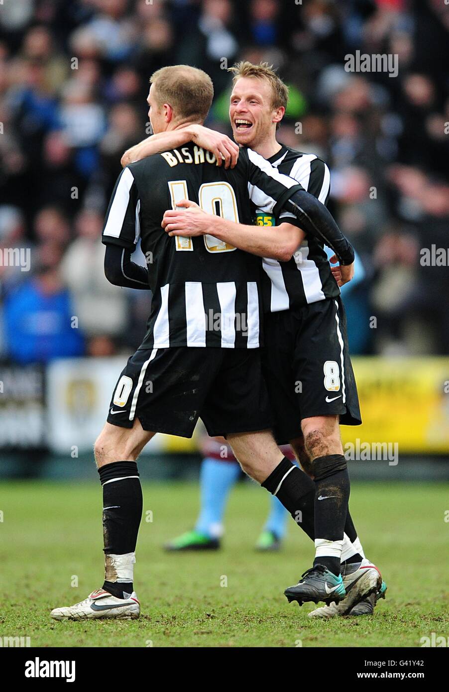 Notts County's Neal Bishop (left) celebrates with team-mate Richard ...