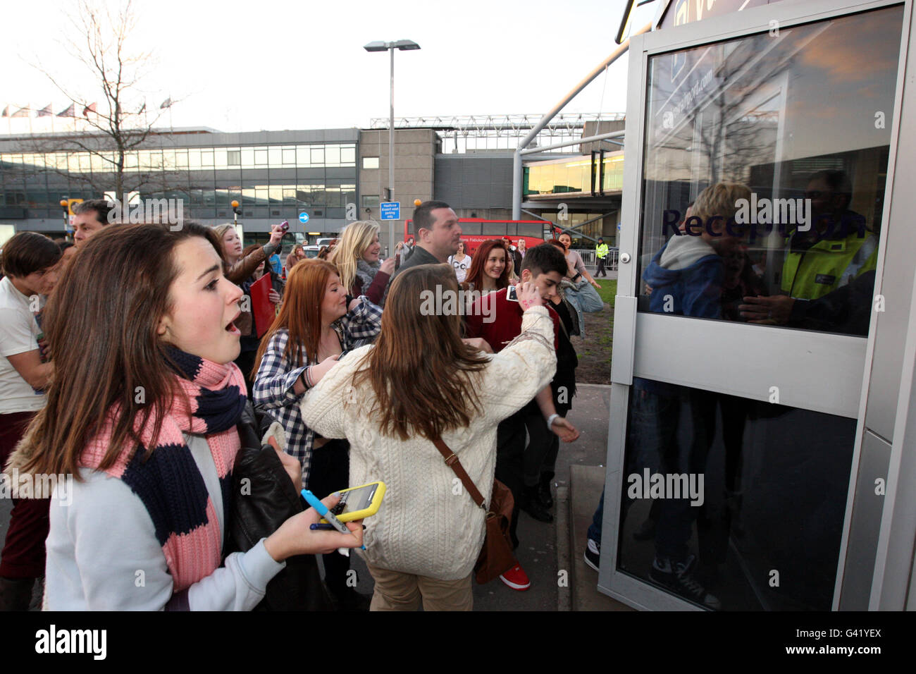 One Direction at Heathrow. Fans surround X Factor boy band stars One ...