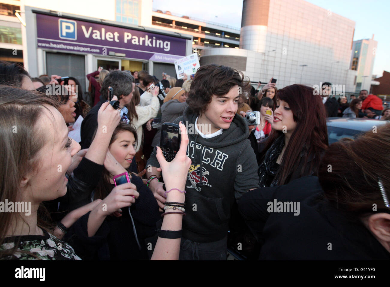 One Direction at Heathrow. Fans pursue X Factor boy band stars One ...