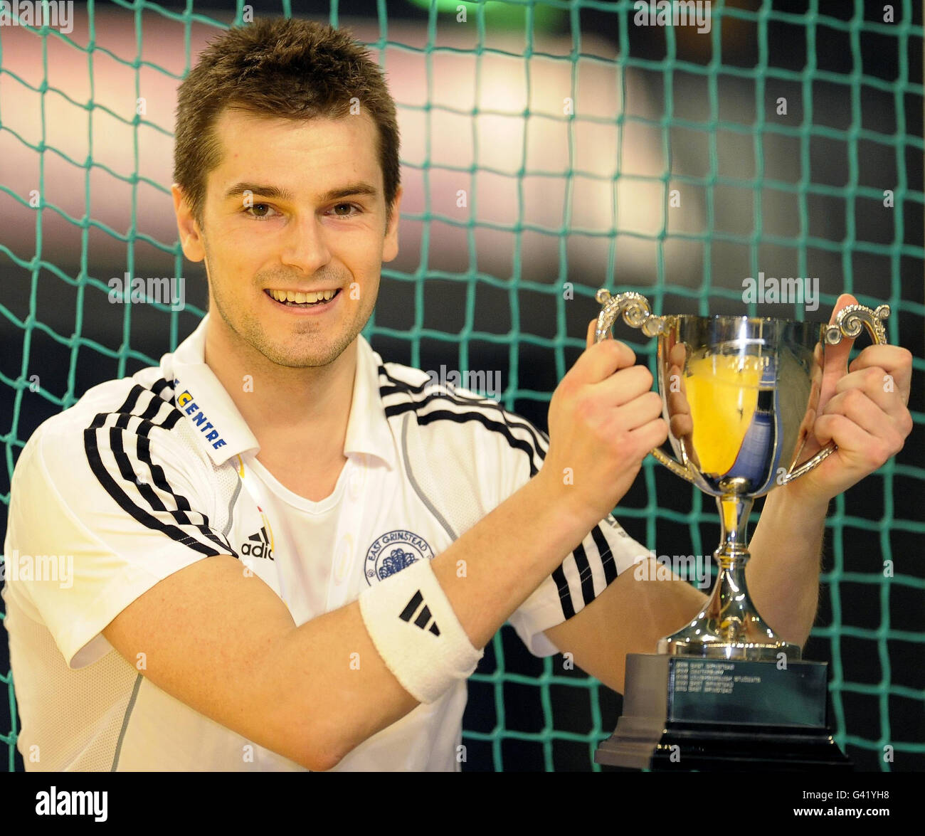 East Grinstead's David De Prez with the trophy after scoring a hat ...