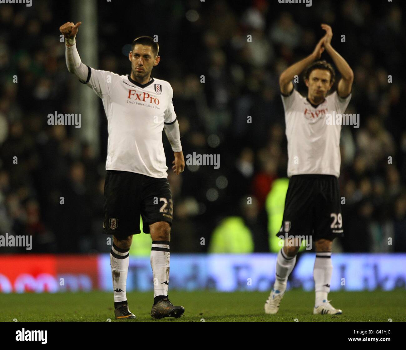 Fulham's Clint Dempsey (left) and Simon Davies (right) thanks the fans ...