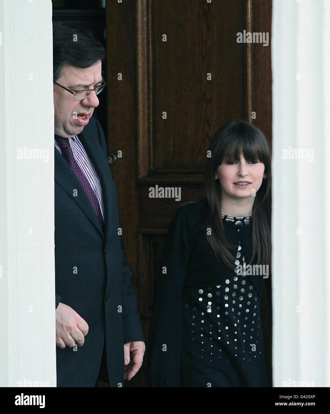 Brian Cowen with his daughter Maedhbh leaves the Aras after he attended ...