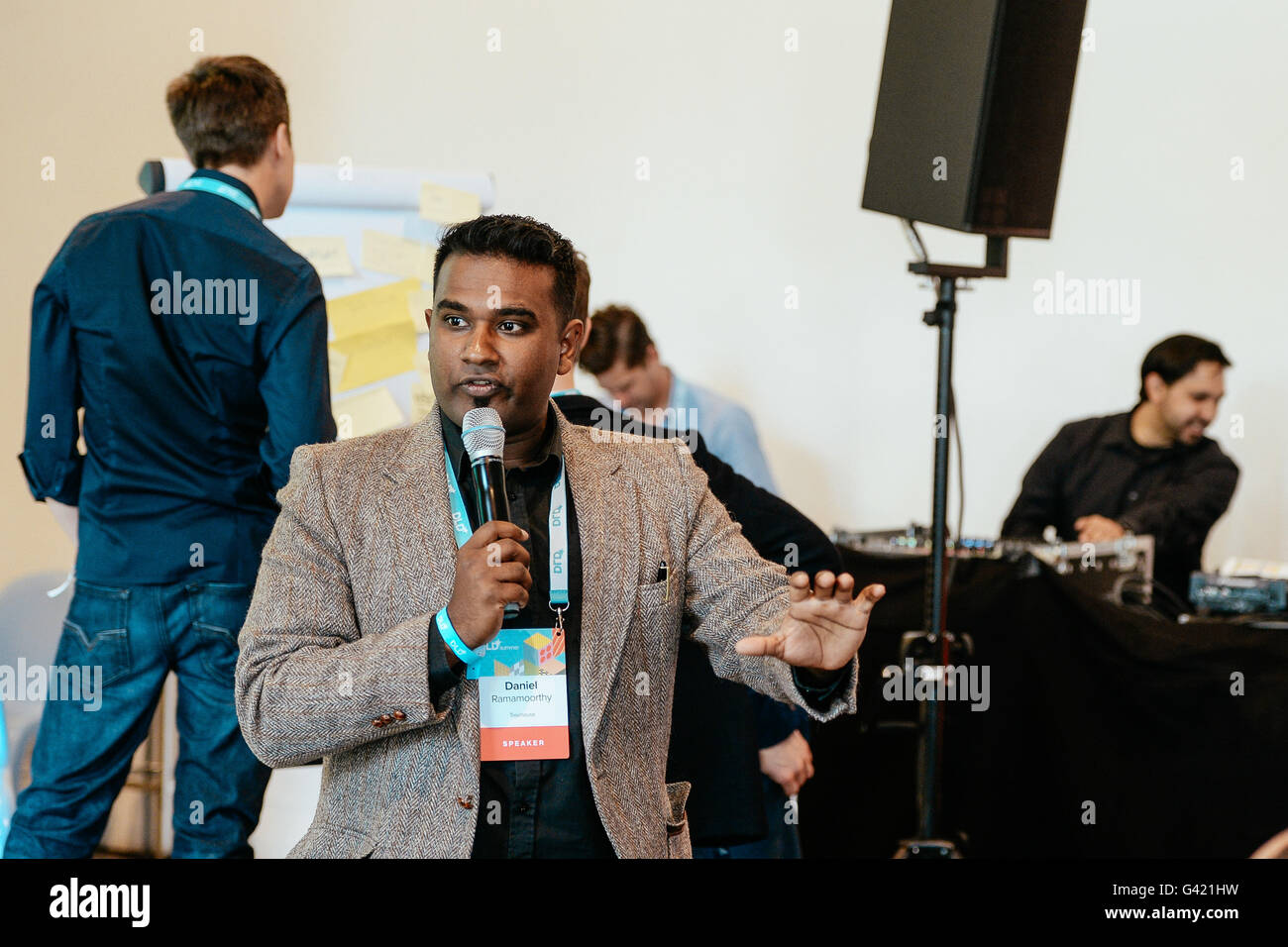 MUNICH/GERMANY - JUNE 16: Daniel Ramamoorthy (Serial Entrepreneur) talks to participants during ...