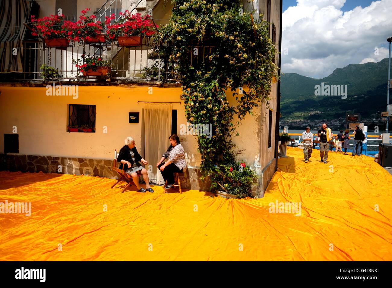 Sulzano, Italy. 17th June, 2016. Orange fabric on the shore of Lago d ...