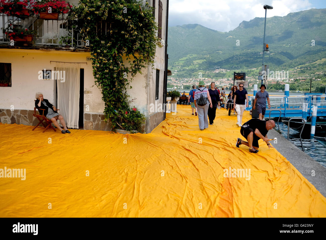 Sulzano, Italy. 17th June, 2016. Orange fabric on the shore of Lago d ...