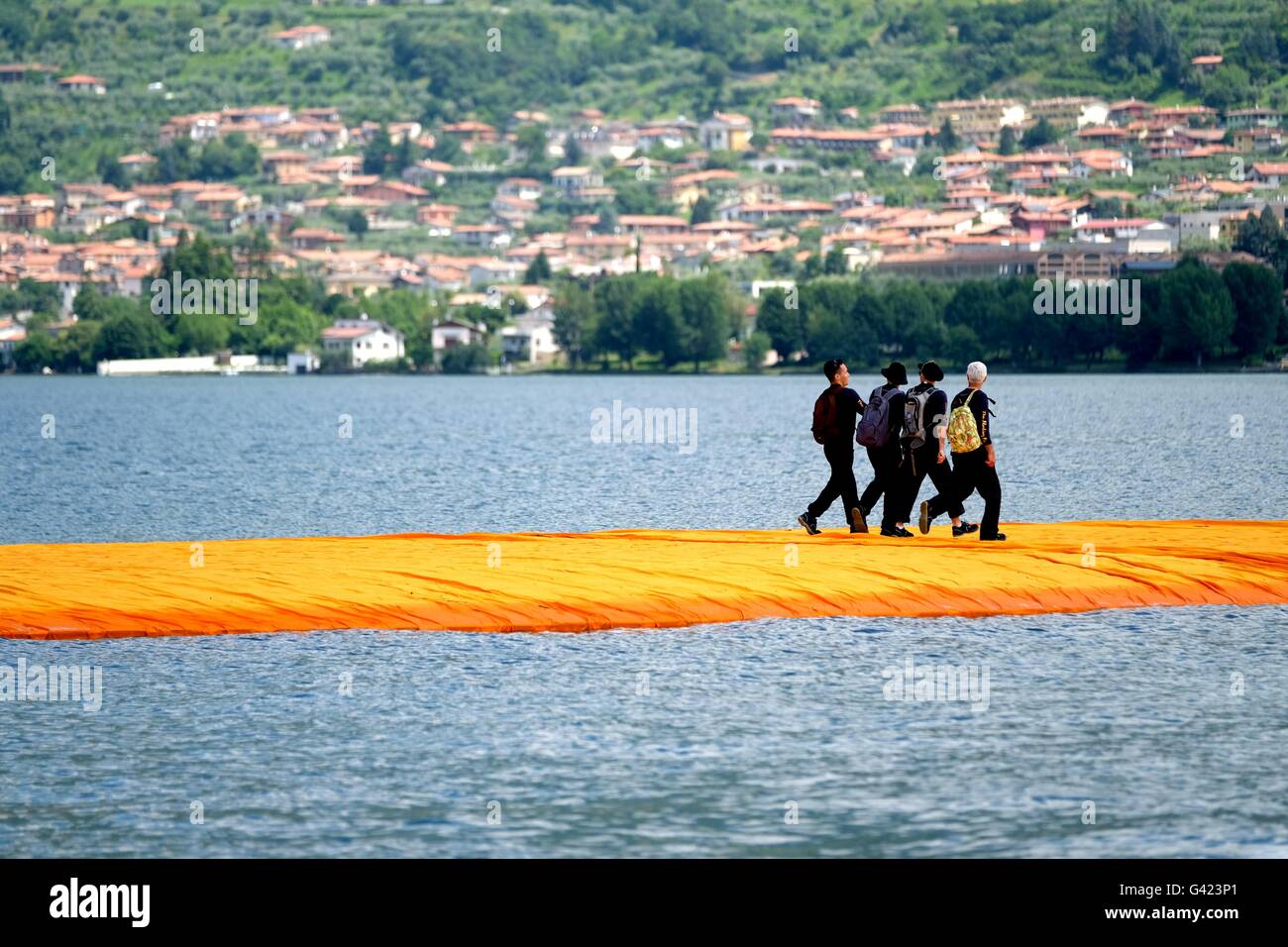 Sulzano, Italy. 17th June, 2016. People walking along the orange ...