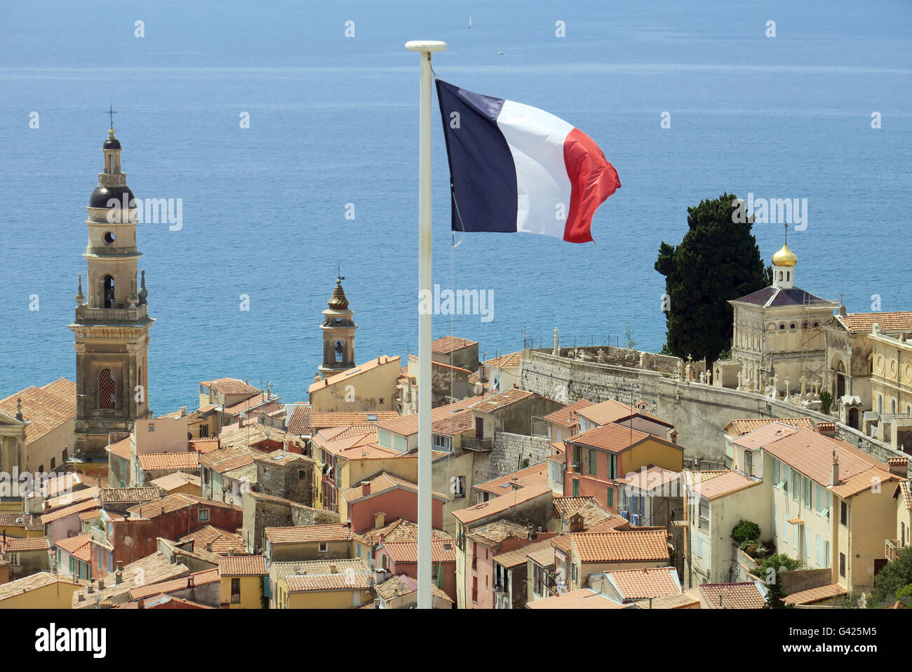 Menton, France. 6th June, 2016. The French flag above the old town of ...