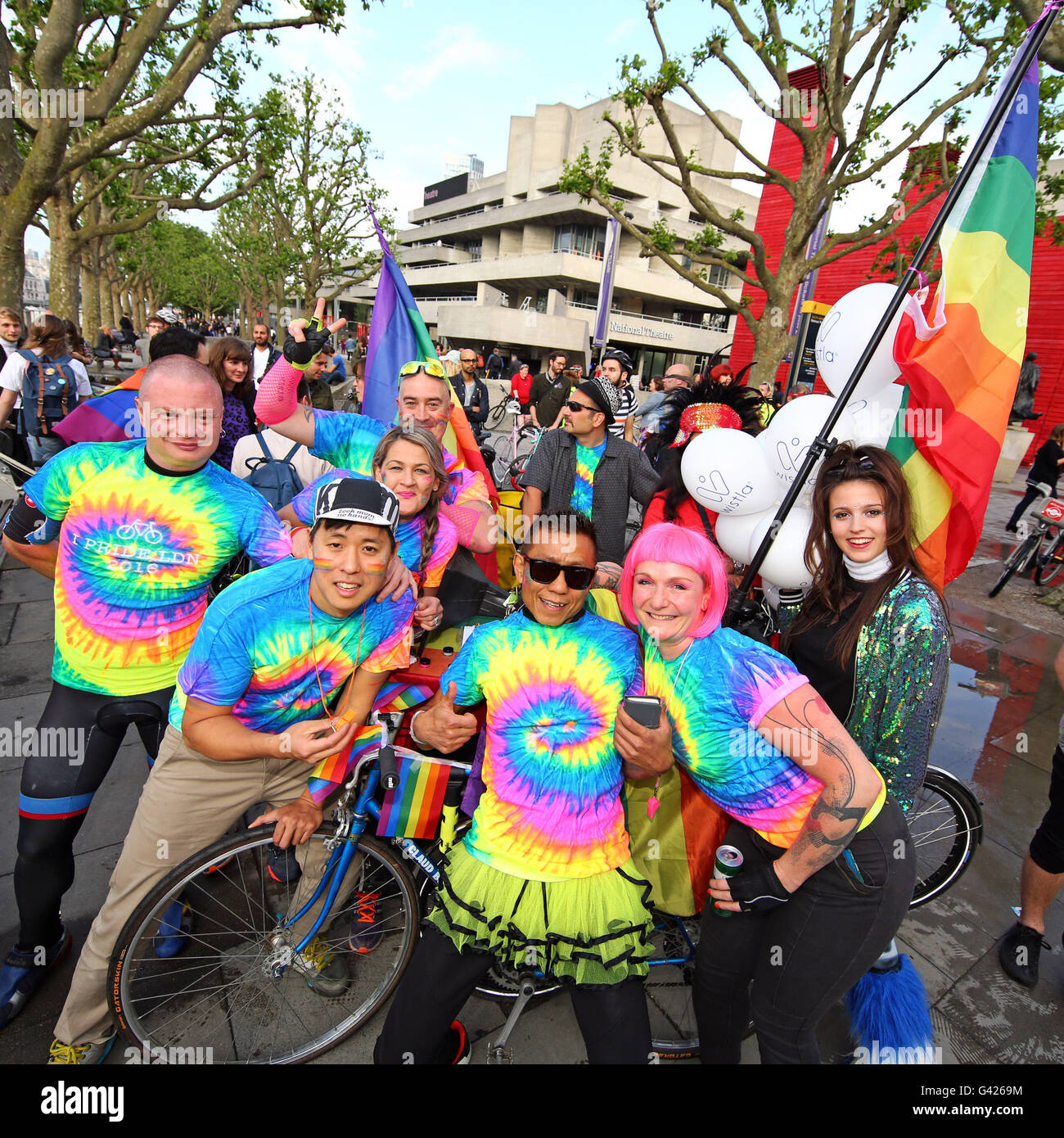 London, UK. 17th June 2016. Cyclists with rainbow flags join in the ...