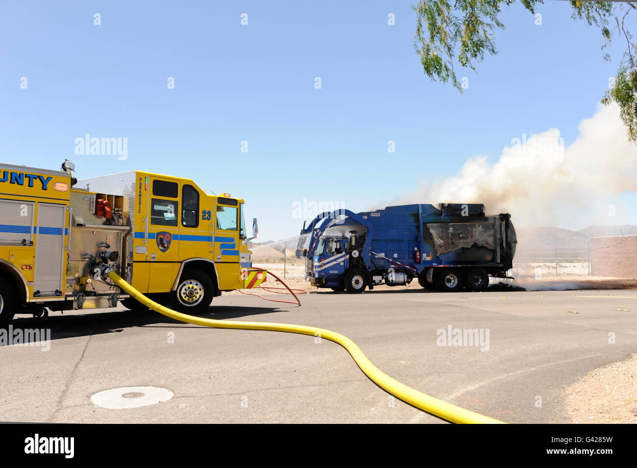 Battle a garbage truck on fire hi-res stock photography and images - Alamy