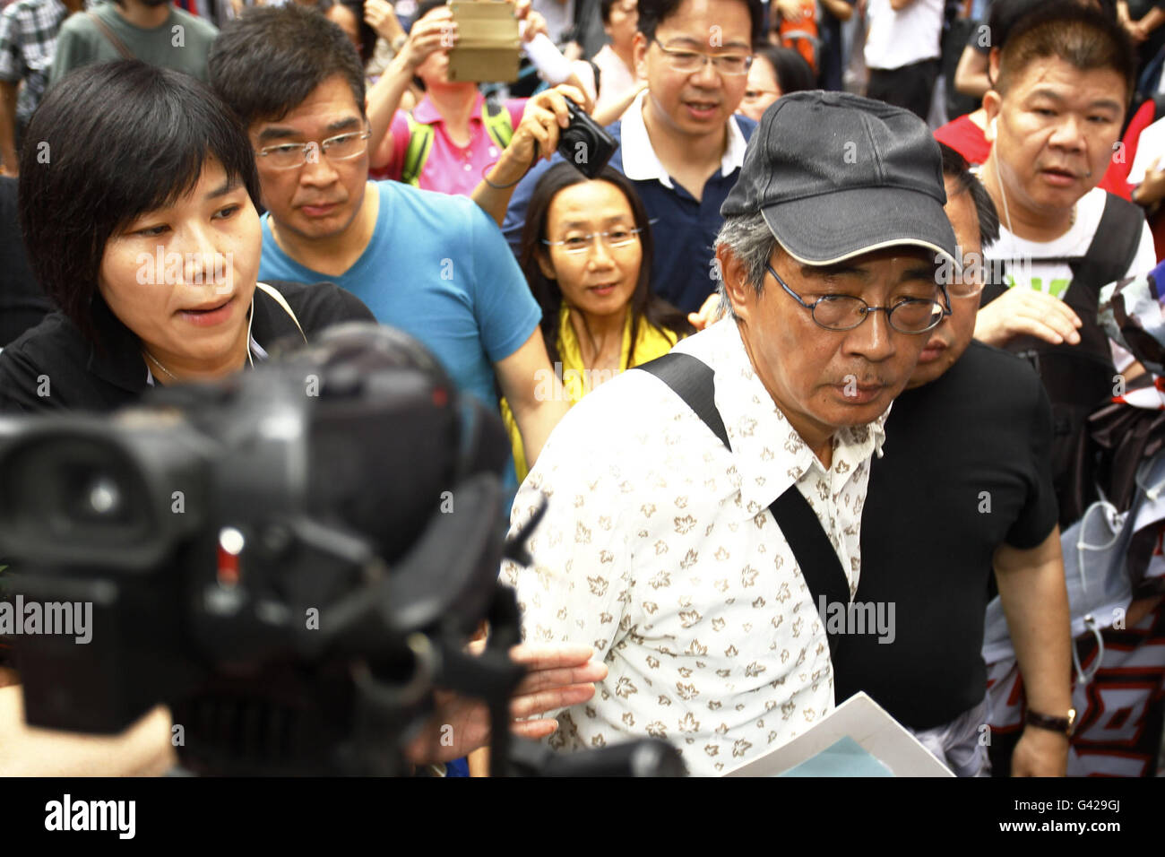 Hong Kong. 18th June, 2016. Lam Wing-Kee ( R ) appeared outside his ...