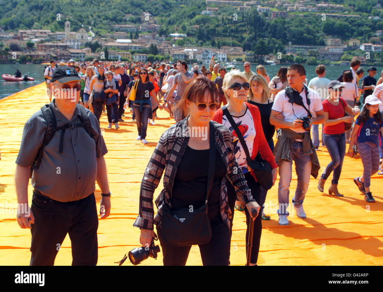 Sulzano, Italy. 18th June, 2016. Visitors walk across floating piers ...