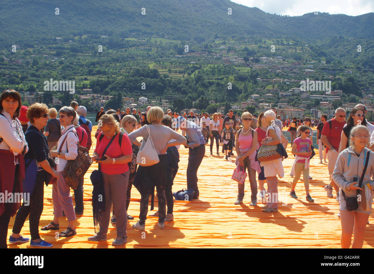 Sulzano, Italy. 18th June, 2016. Visitors walk across floating piers ...