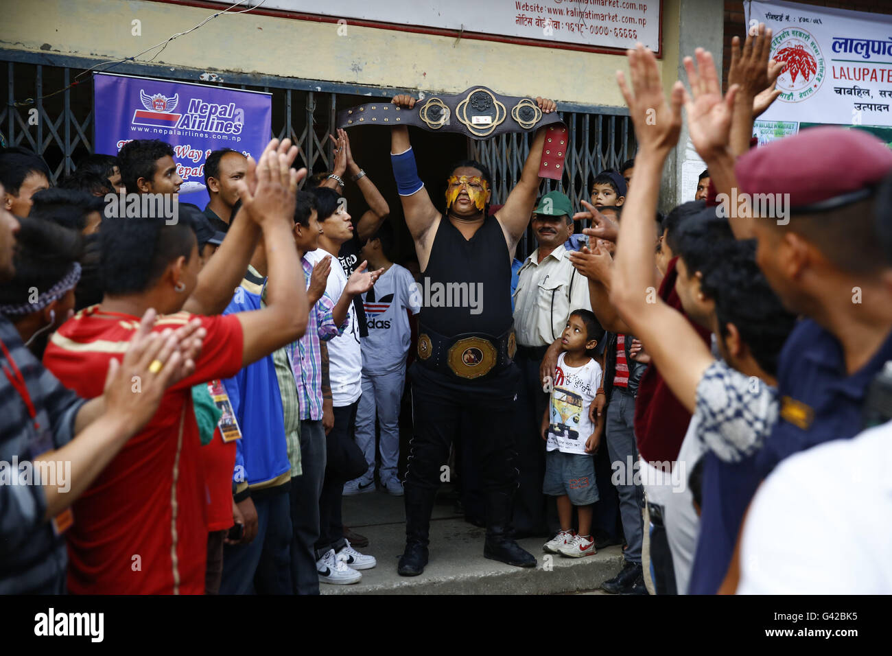Kathmandu, Nepal. 18th June, 2016. A Nepalese wrestler Yeti enters the ...