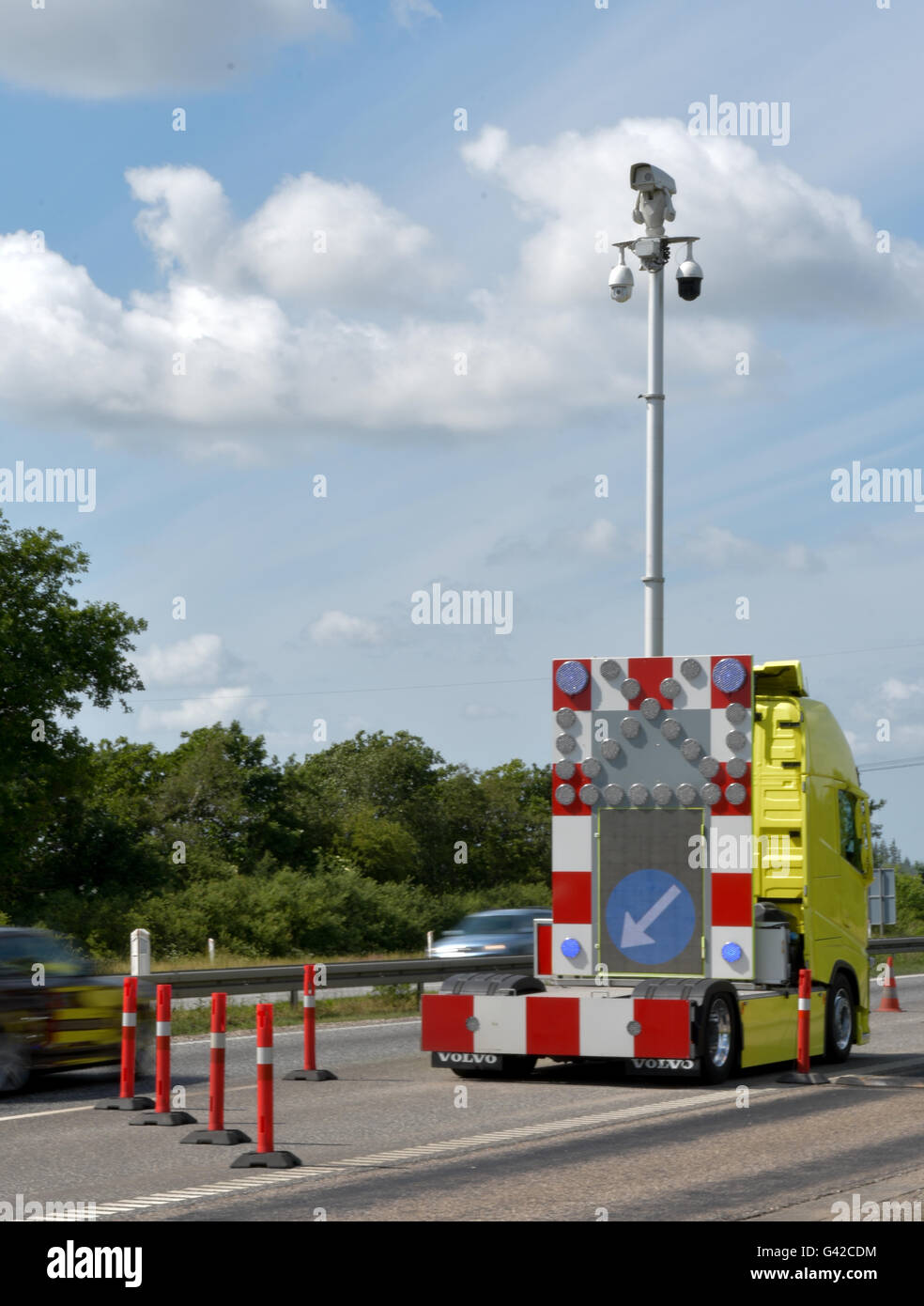 A license plate number scanner mounted onto a truck captures the ...