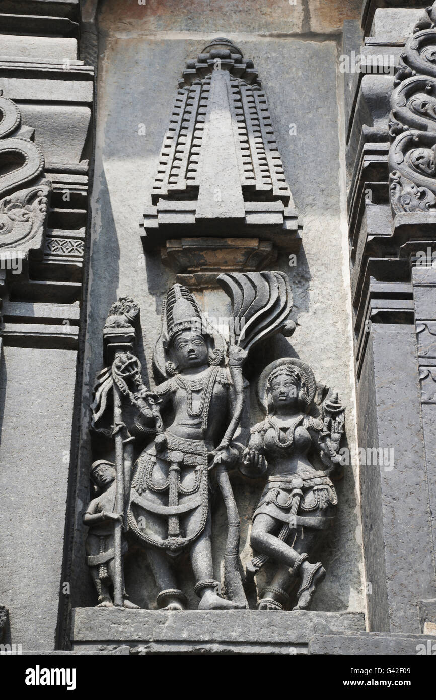 Ornate wall panel reliefs depicting Kamadeva and his consort Rati ...