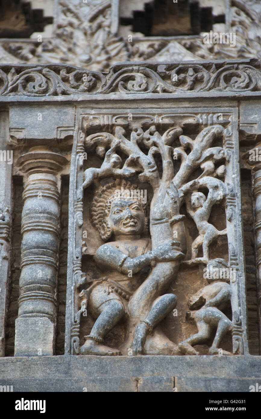 Sculpture of Bhima shaking the tree and Kauravas are falling down ...