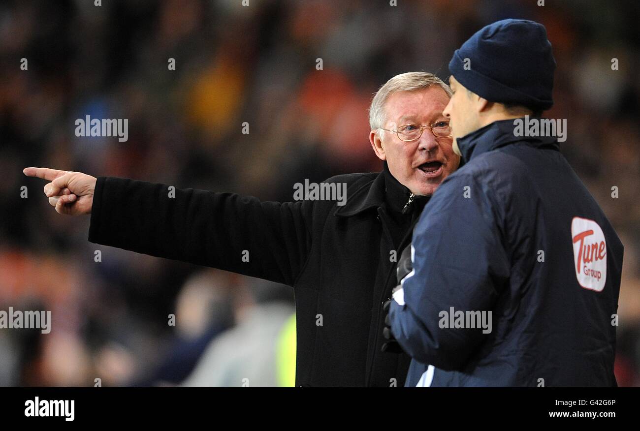 Manchester United manager Alex Ferguson (left) complains to fourth ...