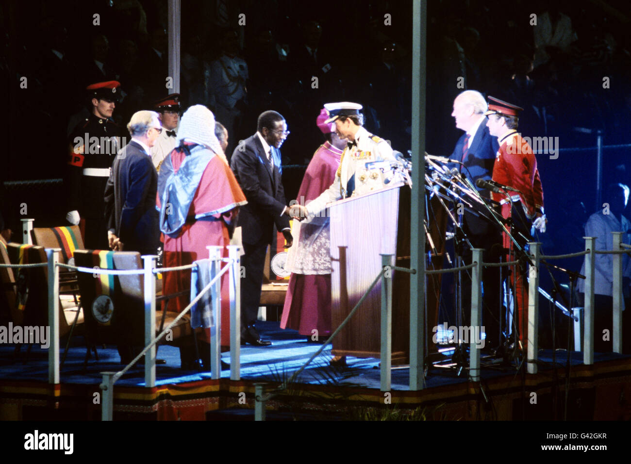 The Prince of Wales shaking hands with Robert Mugabe, the Prime ...