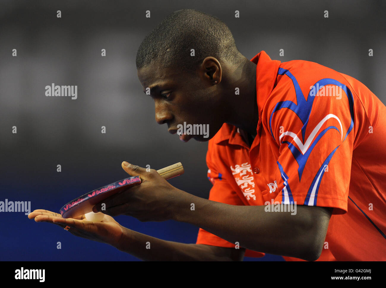 England's Darius Knight prepares to serve to Ireland's John Murphy ...