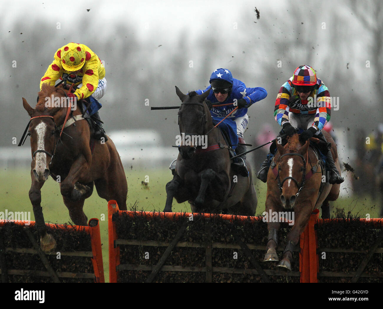 Nobunaga ridden by jockey Aidan Coleman (right) jumps the last fence to ...