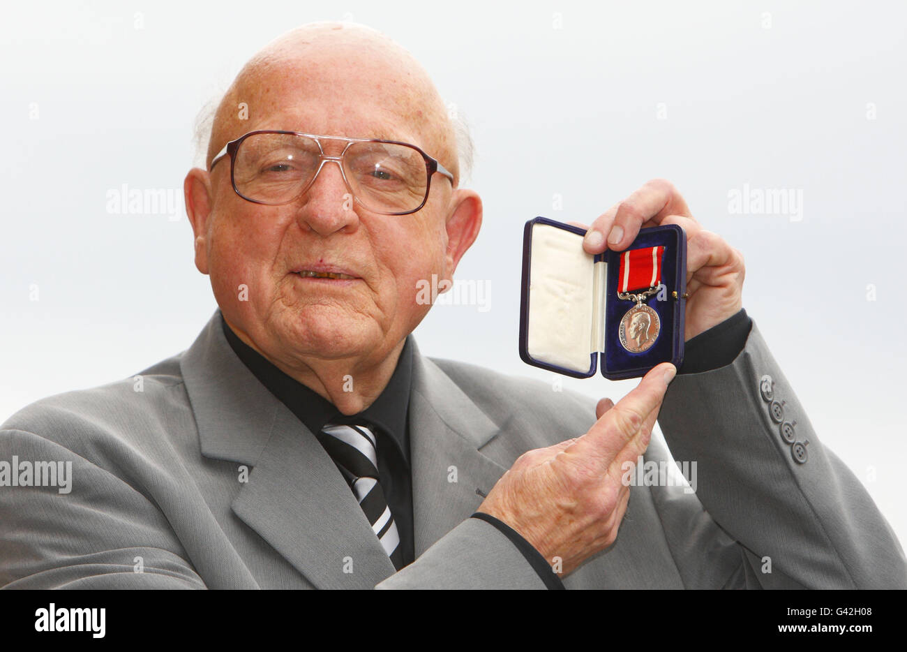 Raymond Morris proudly shows the Silver Sea Gallantry Medal ...