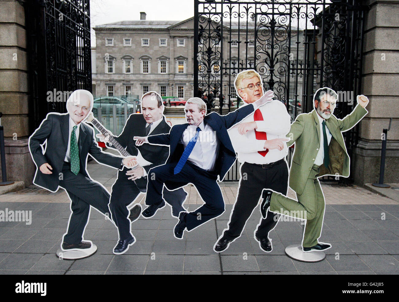 Five cut outs of the main political party leaders placed outside ...