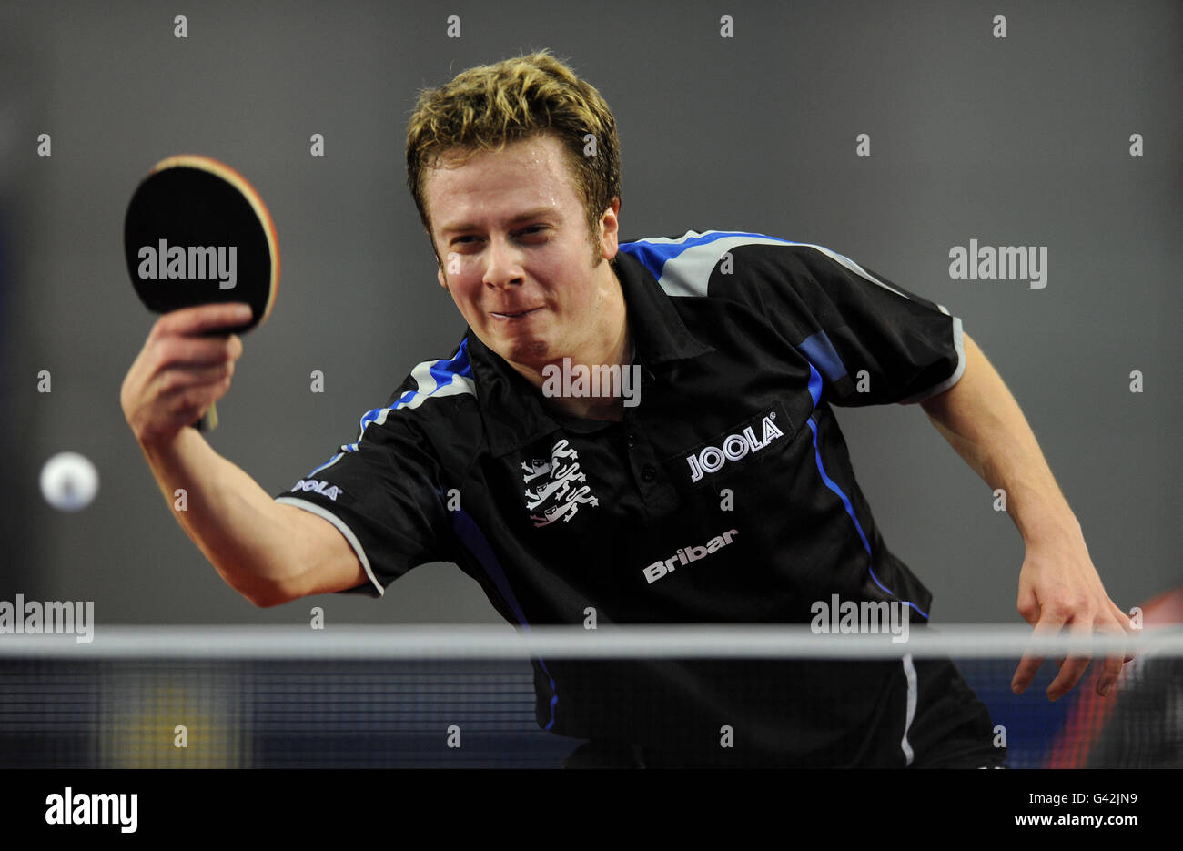 England's Andrew Baggaley in action against Singapore's Zhongze Liu ...