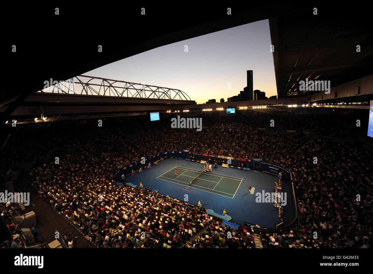 The sun sets over the Rod Laver Arena during the match between Rafael ...