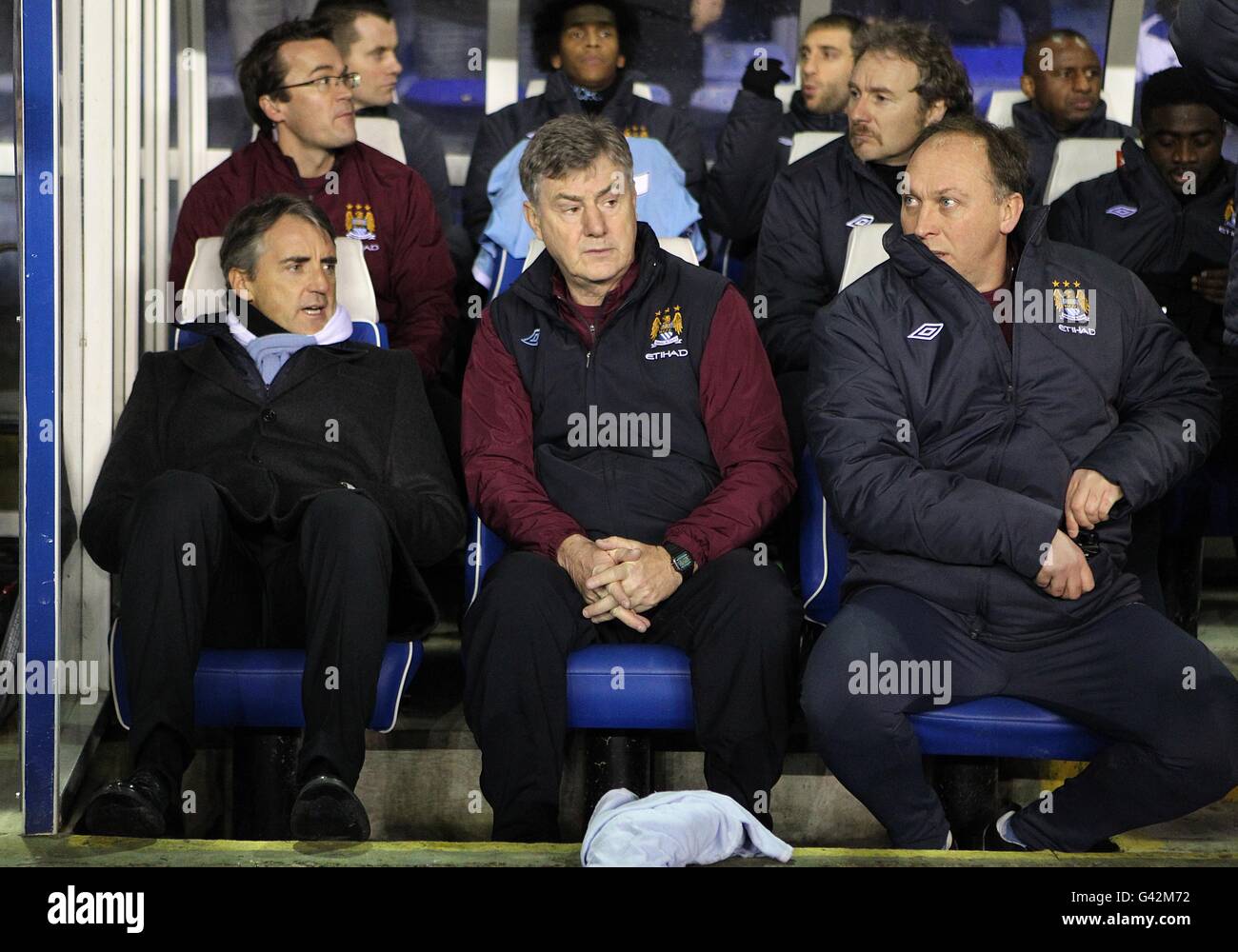 Manchester City manager Roberto Mancini (left), Assistant manager Brian ...