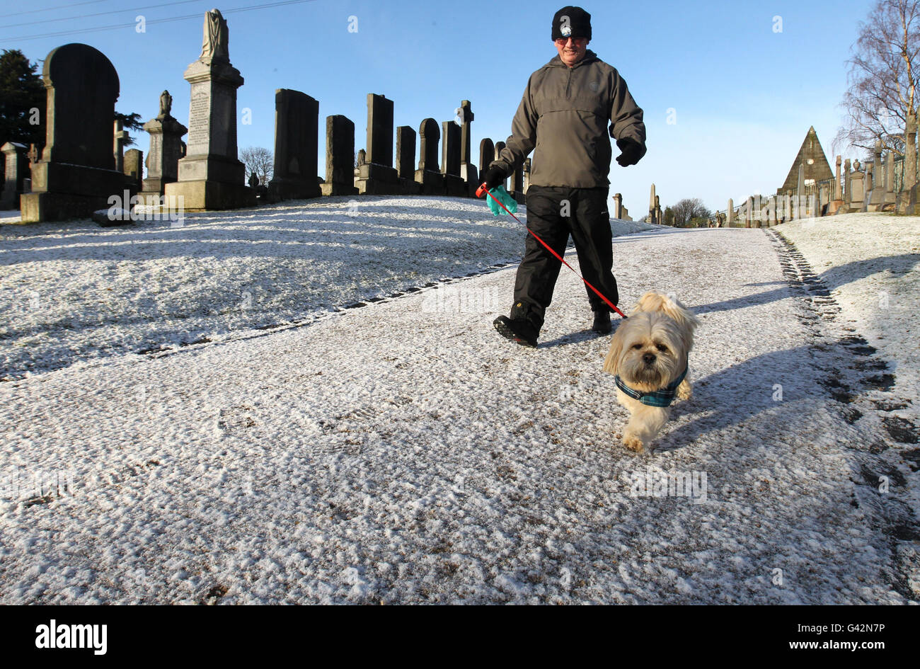 Man walking through cemetery in hi-res stock photography and images - Alamy