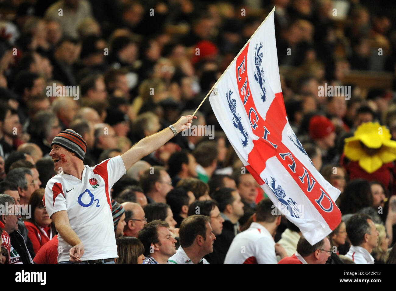 An england fan waves a giant flag in the stands hi-res stock ...