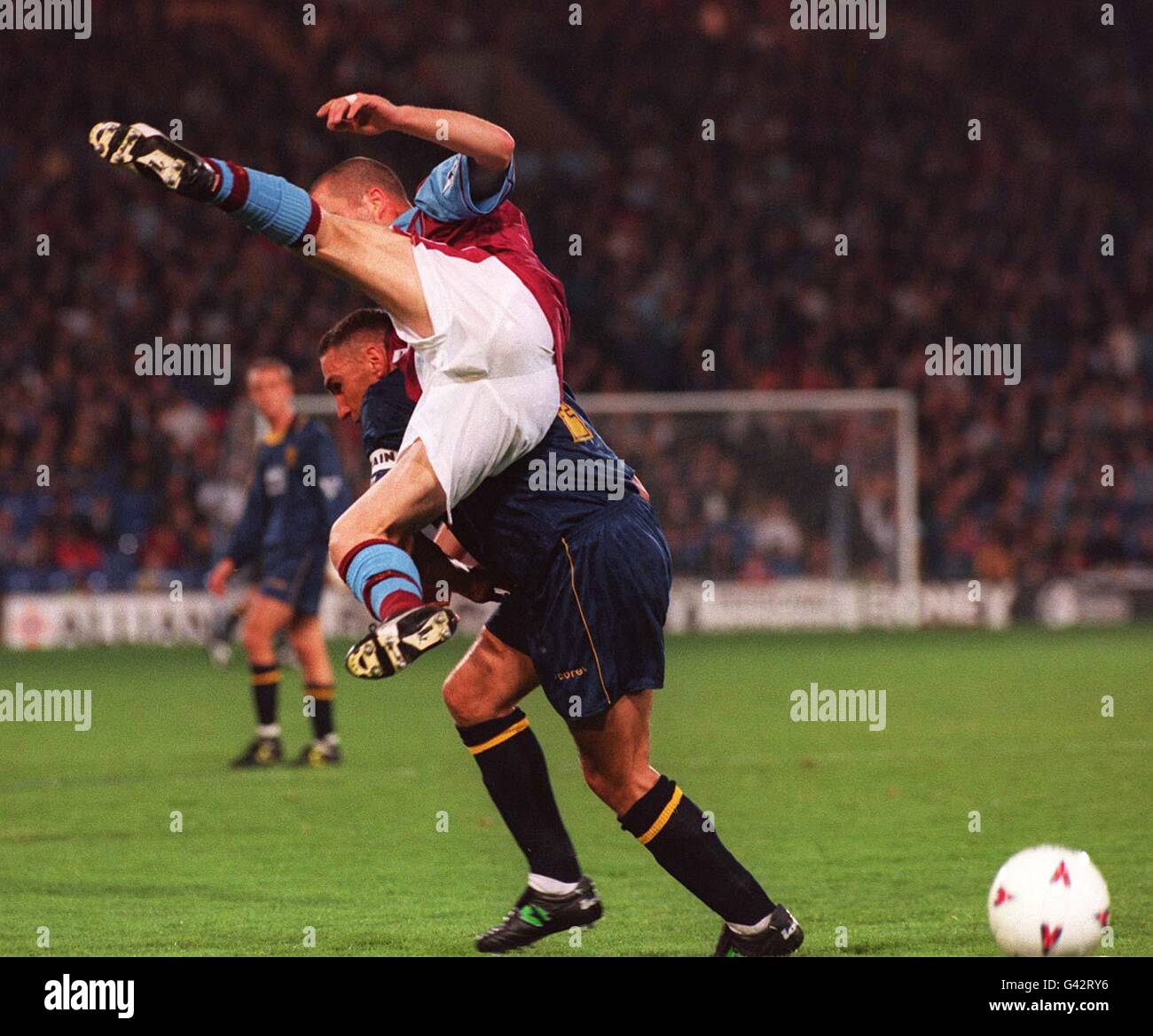 The hard men collide at Selhurst Park as West Ham's Julian Dicks rises ...