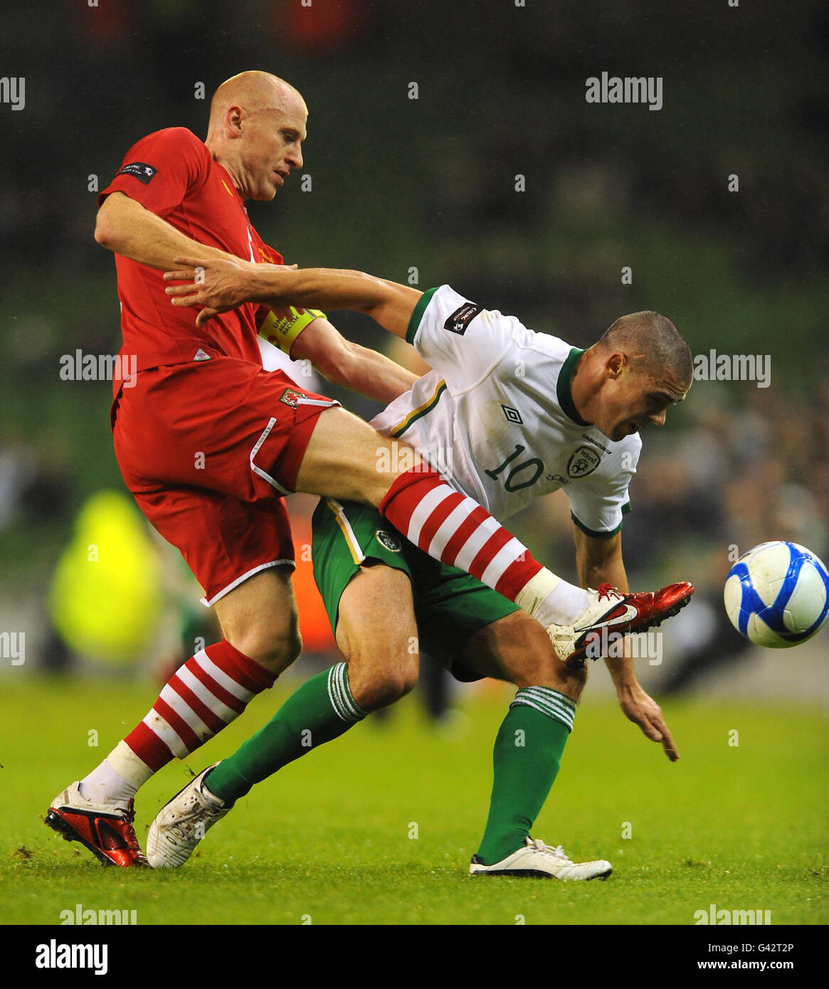Wales' James Collins (left) and Republic of Ireland's Jonathan Walters ...