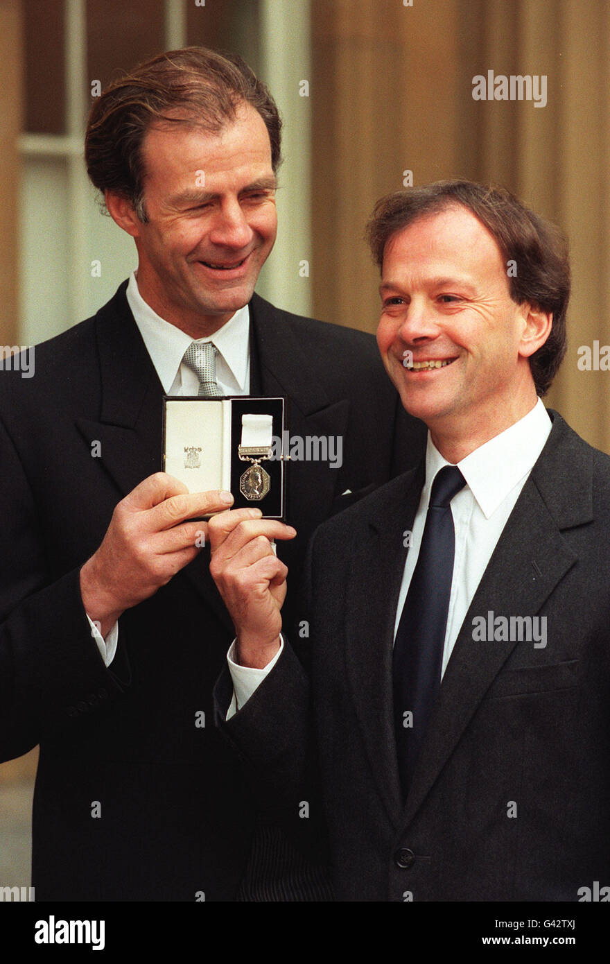 Dr Michael Stroud receives OBE Stock Photo - Alamy
